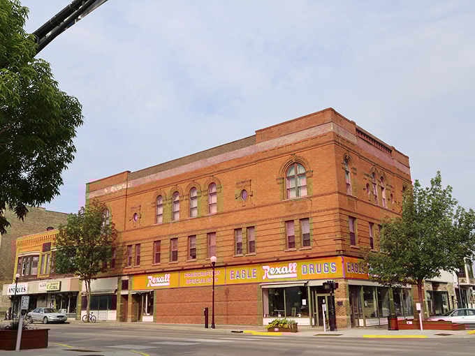The historic Rexall Drugs building stands proud on Main Street, where small-town charm meets timeless American architecture.