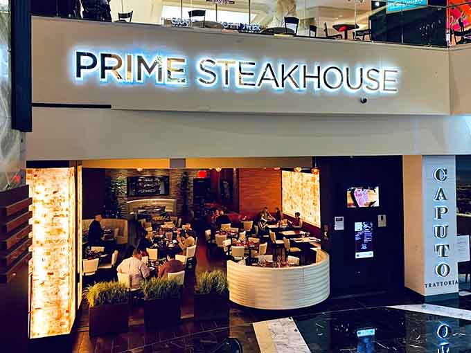 Those gleaming letters spell out exactly what's happening: prime beef prepared with precision and served with style.