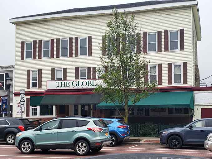 The Globe's classic facade and green awning welcome visitors like an old friend who's always glad to see you.
