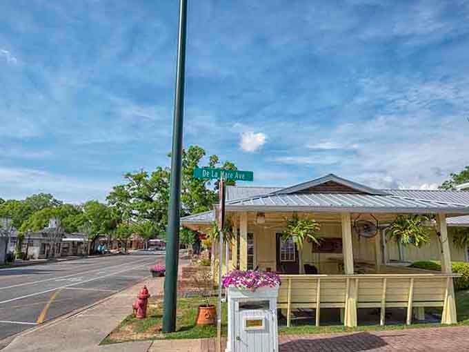 Those hanging flower baskets and cheerful building whisper "slow down" louder than any vacation ever could.