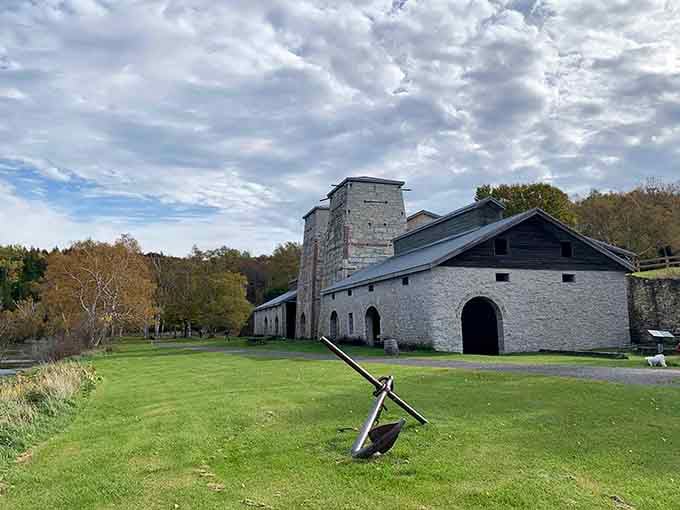 Massive stone furnaces tower over the historic town site, reminders of the industrial might that once thrived here.