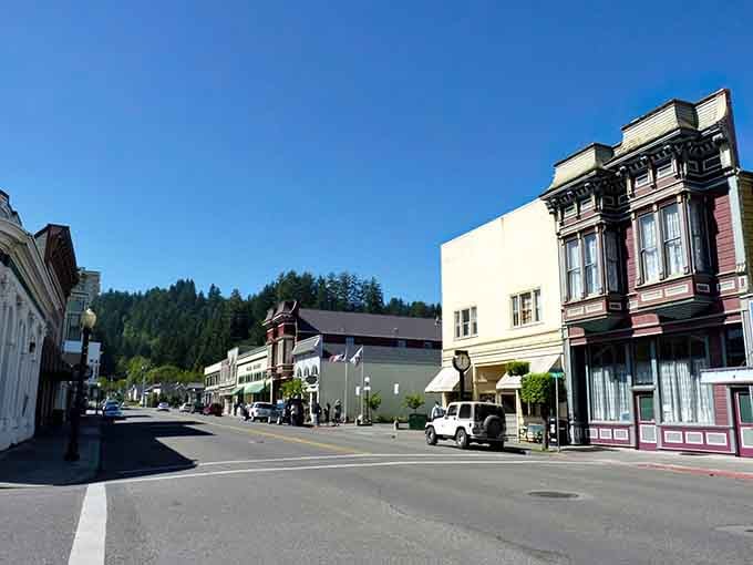 Those colorful Victorian storefronts pop against the pine-covered hills like a postcard from 1885.
