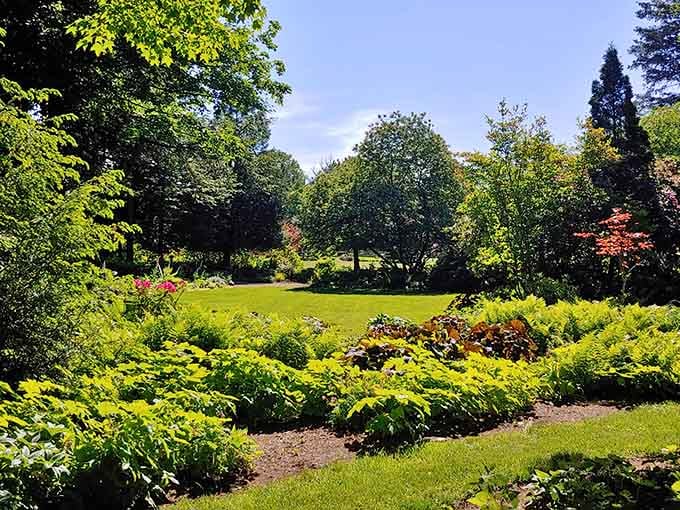 Sunlit lawns and carefully tended beds showcase nature's artistry in every season of the year.