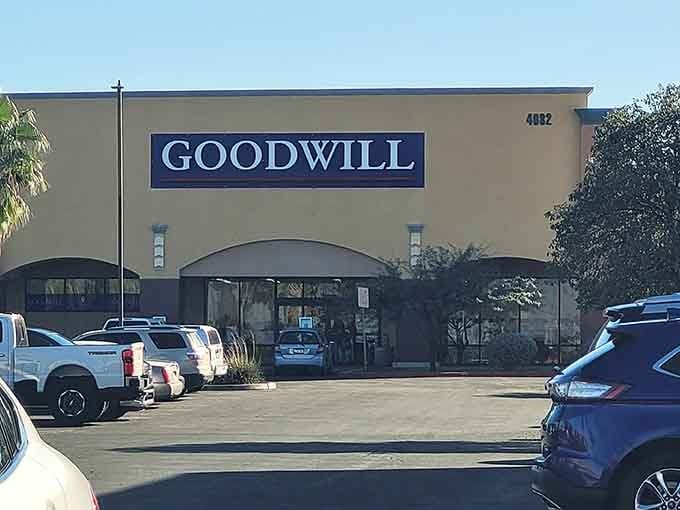 Morning light catches the storefront where patient shoppers know the best discoveries await just beyond those glass doors.
