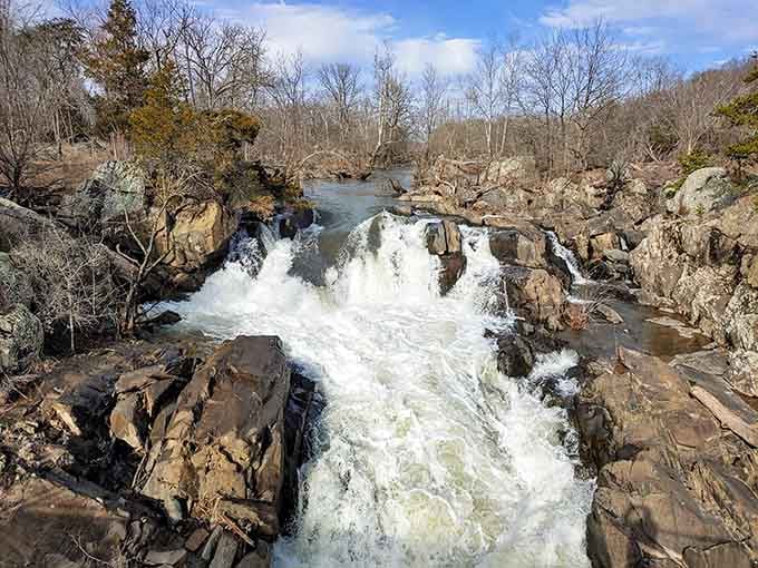 Water crashes through jagged rock formations with the kind of raw power that makes you respect nature's strength.