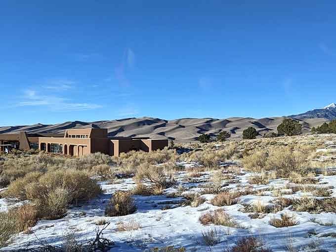 The visitor center sits humbly before North America's tallest dunes, a gateway to nature's sandy masterpiece.