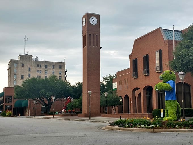 That brick clock tower stands proud like a patient grandfather watching over the town square below.