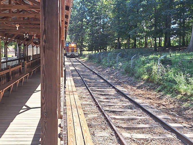 Waiting at the covered platform, you can almost hear the whistle calling passengers to board for their journey ahead.