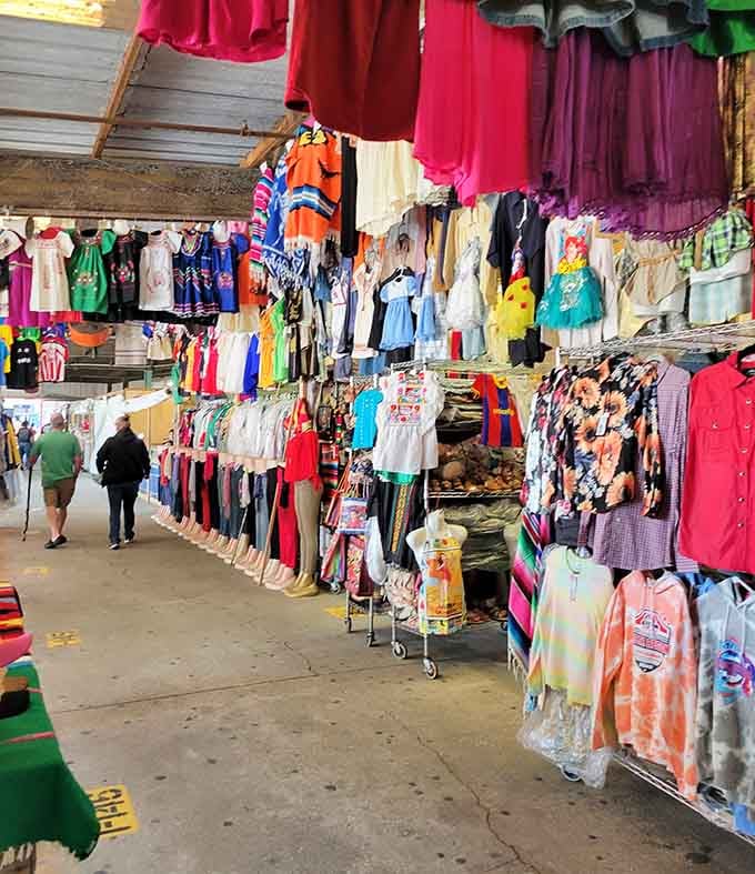 A kaleidoscope of hanging clothes creates a fabric waterfall that would make Joseph's technicolor dreamcoat jealous of the selection.