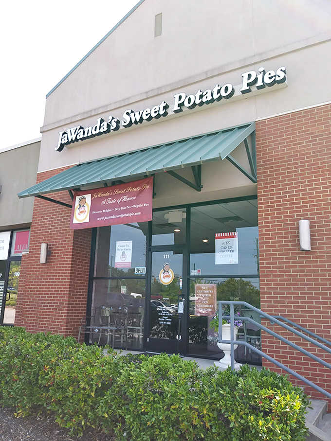 The brick facade and turquoise awning create an inviting spot where pies are made with genuine care and attention.