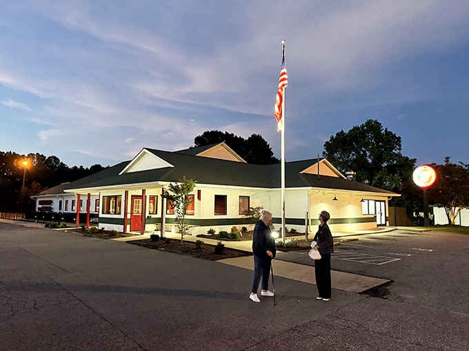 Classic barbecue joint vibes with red trim and green roof promise finger-licking goodness inside those doors.