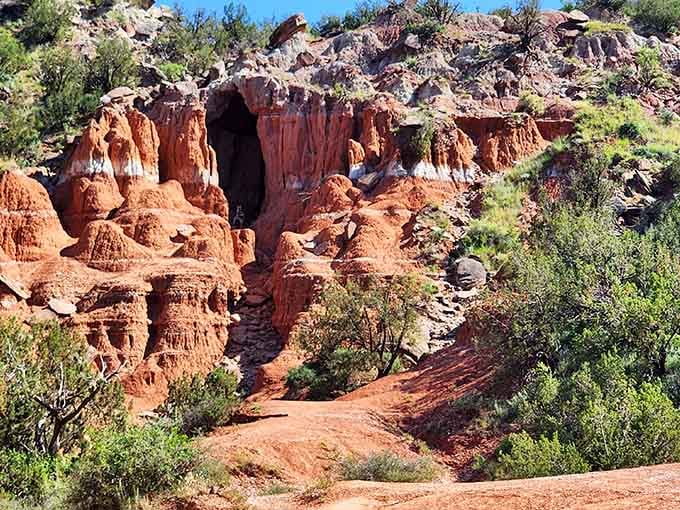Carved canyons reveal layers of rust and crimson, nature's own masterpiece painted over millions of patient years.