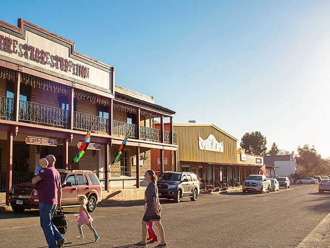 Families stroll past historic buildings on streets where time moves slower and smiles come easier than anywhere else.