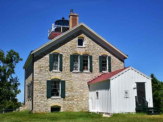 That brick chimney reaching skyward adds character to an already stunning lakeside landmark that's stood the test of time.
