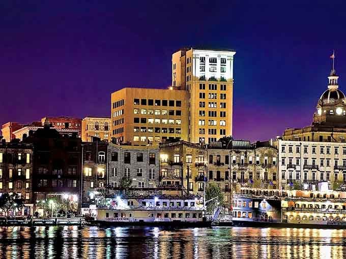 City lights dance on the river like fireflies at a waterfront party that never ends, honestly magical.