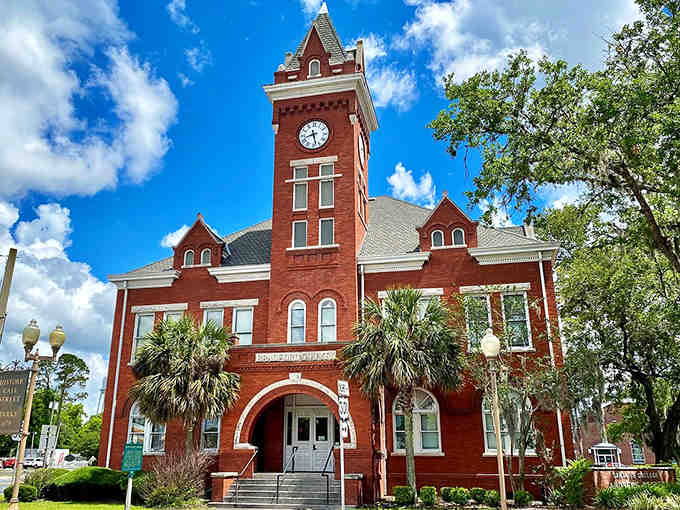 That clock tower stands proud against blue skies, reminding everyone that time moves differently in peaceful places.