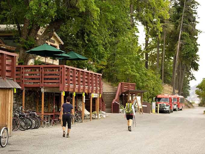 Bicycles line the rustic wooden walkway where visitors stroll past shops, leaving their worries back on the mainland.