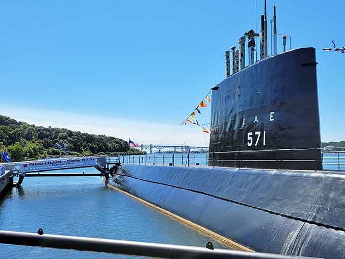 The USS Nautilus sits proudly in the water, ready to share her remarkable nuclear-powered legacy with curious visitors.