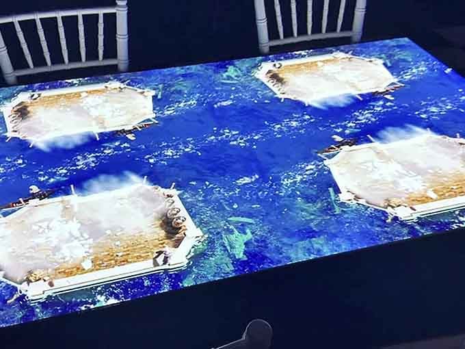 Multiple courses mean multiple animated scenes dancing across your table throughout this futuristic feast experience.