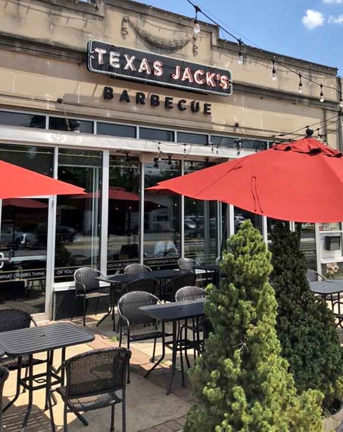 Those bold red umbrellas and vintage signage create the perfect Texas-style welcome on a sun-drenched afternoon.