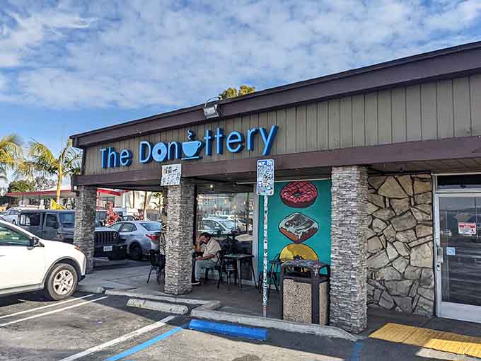 Palm trees sway nearby as The Donuttery welcomes beach-goers and locals seeking warm, made-to-order morning happiness.