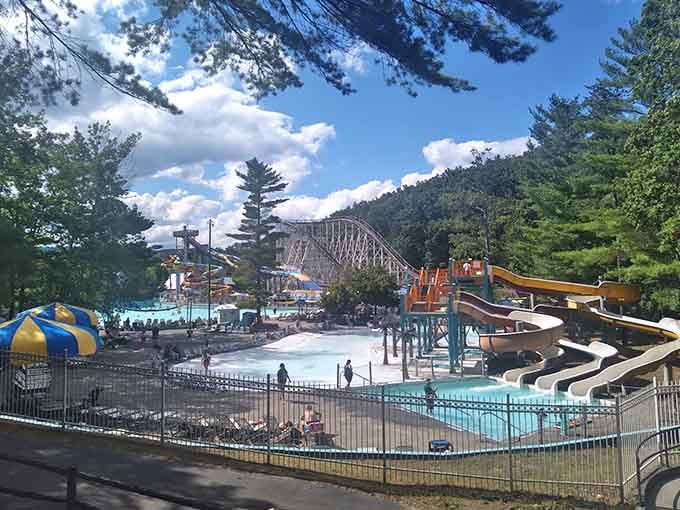 Mountain views frame the wave pool perfectly, proving nature and manufactured fun make excellent neighbors in the Adirondacks.