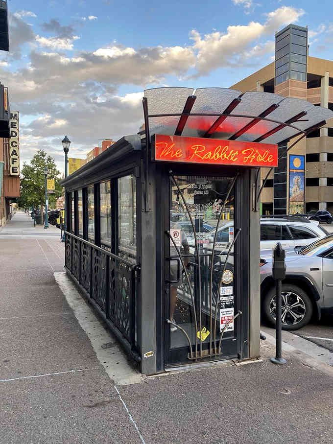 Twinkling lights and ornate metalwork create an entrance that's equal parts whimsy and sophistication.