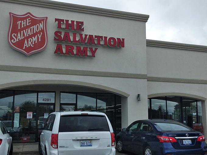 Multiple vehicles parked outside prove this isn't just any thrift store—it's a community gathering spot for smart shoppers.