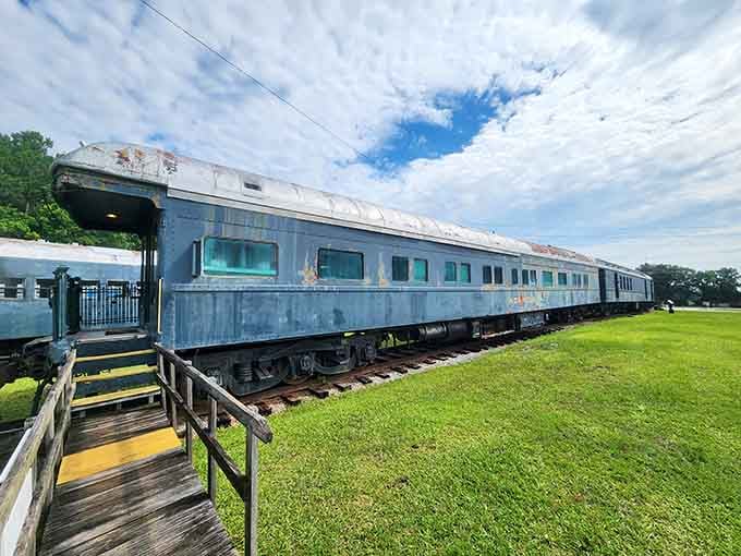 Classic passenger cars rest on authentic tracks, inviting you to step aboard and imagine journeys from bygone days.