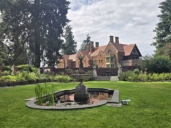 The sunken garden and manicured grounds frame this castle like a scene from Downton Abbey's Pacific cousin.