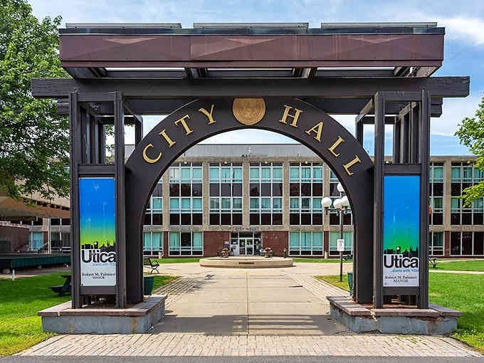 City Hall's grand archway welcomes you to Utica like a gateway to possibilities, framing the civic pride that defines this community.