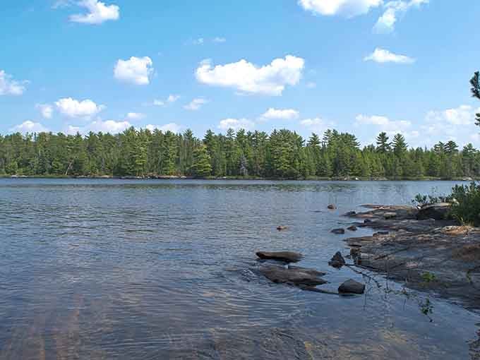 Flat rocks dot the crystal-clear shallows where time seems to pause and breathe.