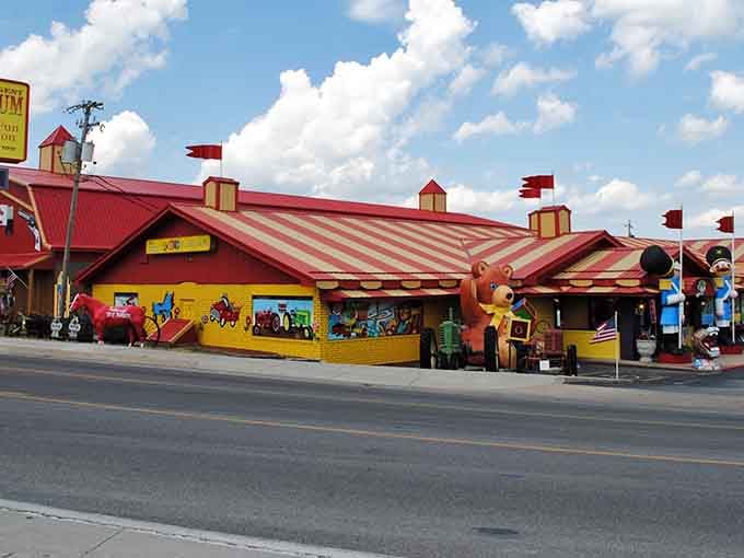 Red and white stripes stretch across the roof like a circus tent, promising the kind of joy you forgot existed.
