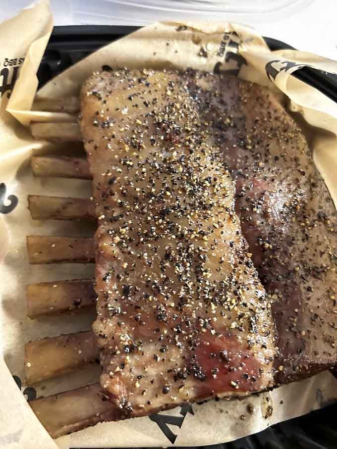 These lamb ribs look like they belong in a prehistoric feast, and honestly, that's the highest compliment possible.