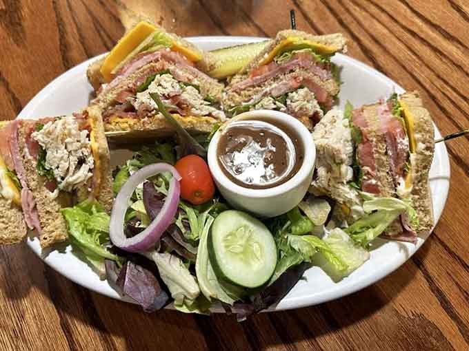 This club sandwich arrives stacked high with layers of flavor that would make even Ringo stop drumming.
