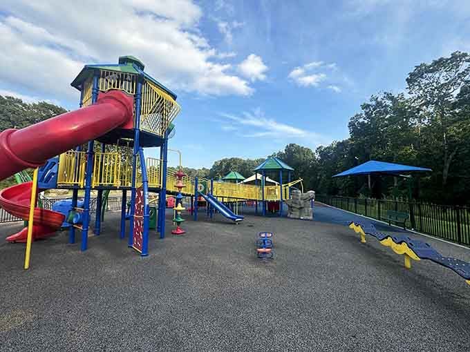 That tower stands tall like a lighthouse of fun, guiding kids to their next great playground discovery.