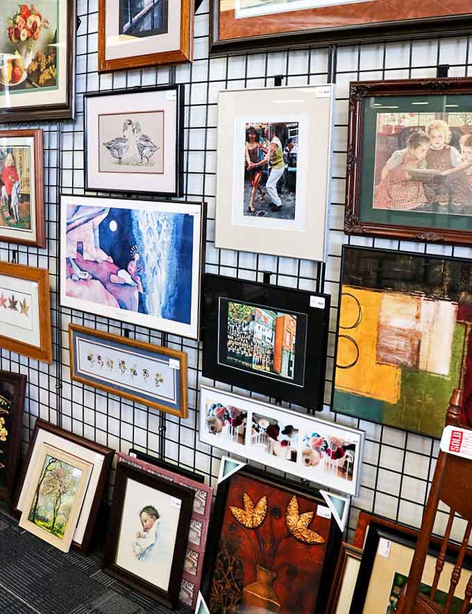 This art wall proves someone's basement clearout is your gallery-worthy find waiting to happen right now.
