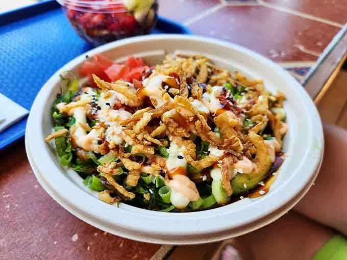 Crispy wonton strips crown this bowl like edible confetti, because every meal should feel like a celebration.