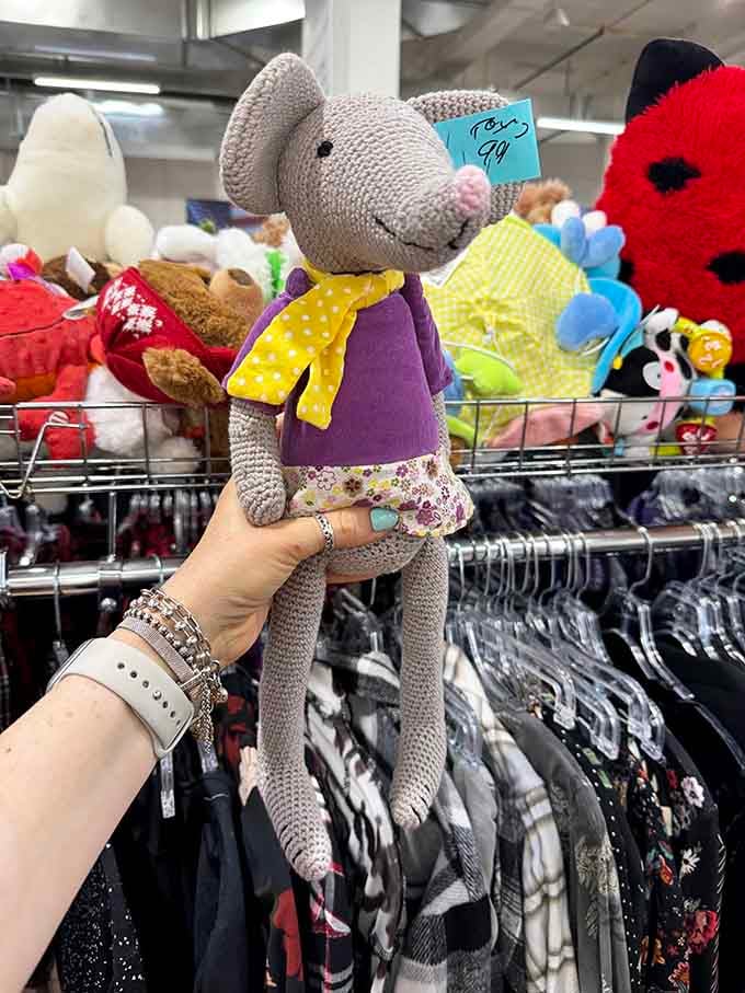 This cheerful elephant in a purple dress is waiting for someone to take it home and love it like new again.