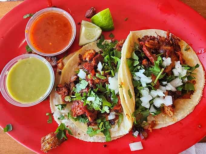 Two perfect tacos with cilantro, onions, and dual salsas &ndash; this is what street food dreams are made of.