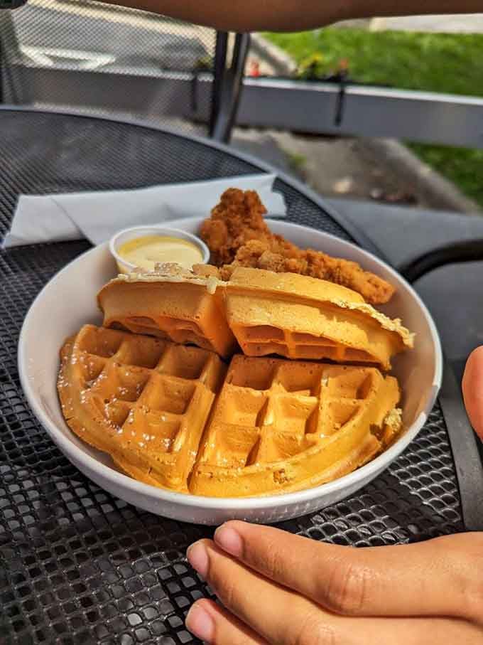 Chicken and waffles with a side of fried chicken tenders, because sometimes more is more and that's perfectly okay with us.