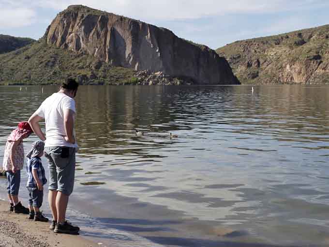 Teaching the next generation that the best screens show sunsets, not cartoons, one lakeside moment at a time.