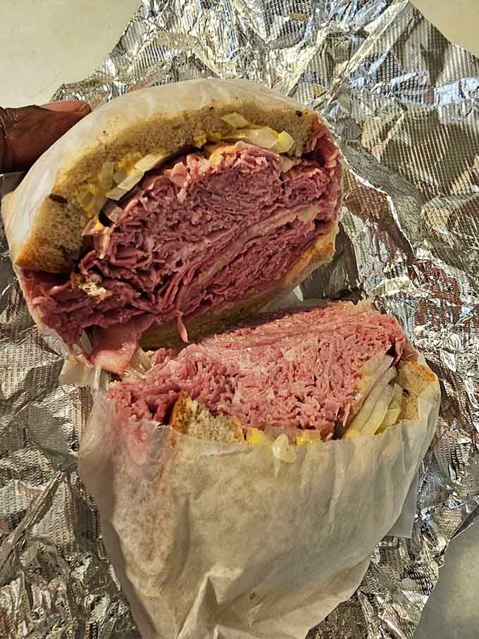 Behold the corned beef masterpiece that defies gravity and possibly several laws of sandwich physics too.