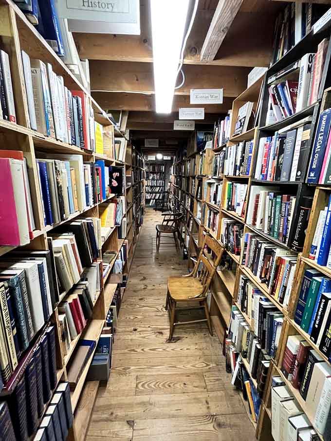 Narrow aisles packed floor to ceiling prove that more books is always the right answer.