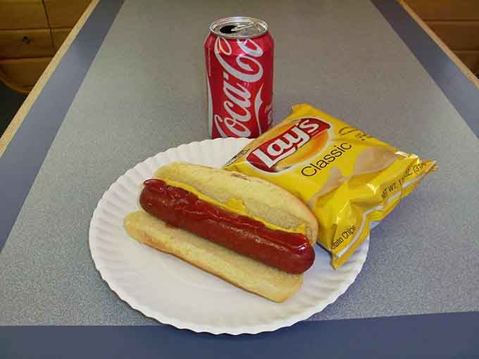 Sometimes the perfect lunch is just a hot dog, chips, and a cold Coke in good company.