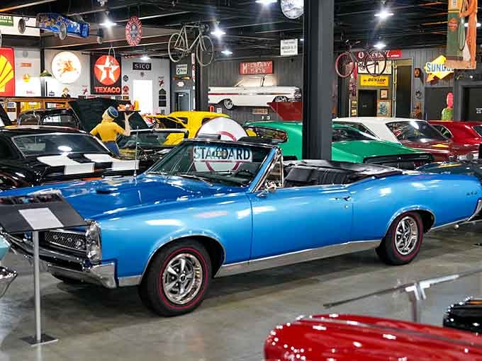 That GTO convertible in electric blue makes every modern sports car look like it's apologizing for being boring.