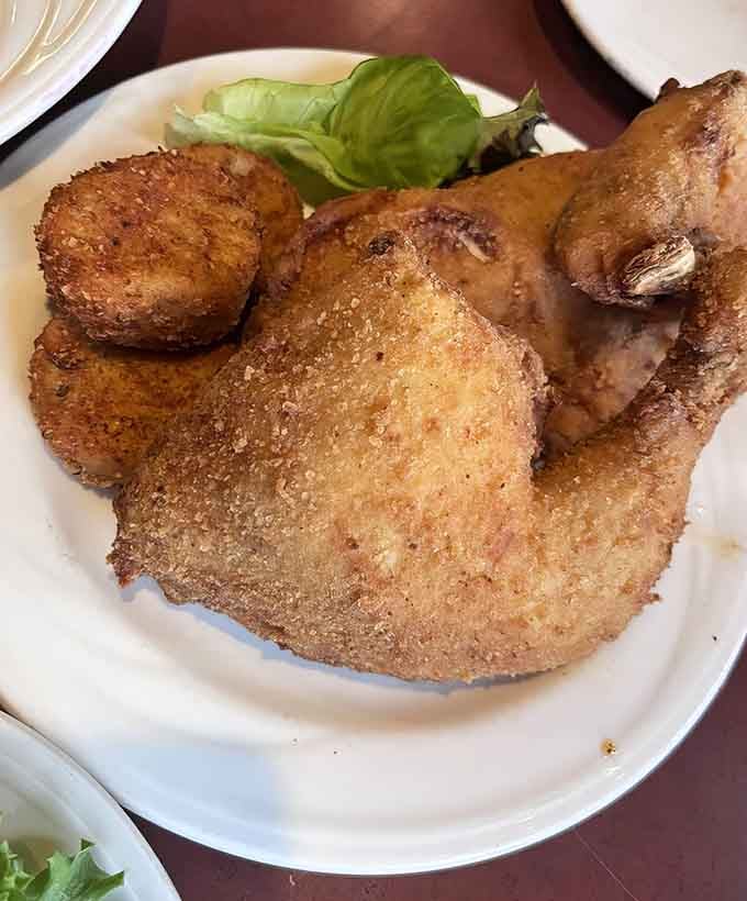 Golden-crusted perfection with those legendary potato cheese puffs that deserve their own fan club and possibly a monument.