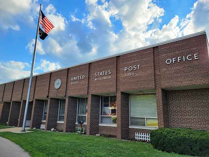 Even the post office looks dignified here, standing proud like it remembers when mail actually mattered.