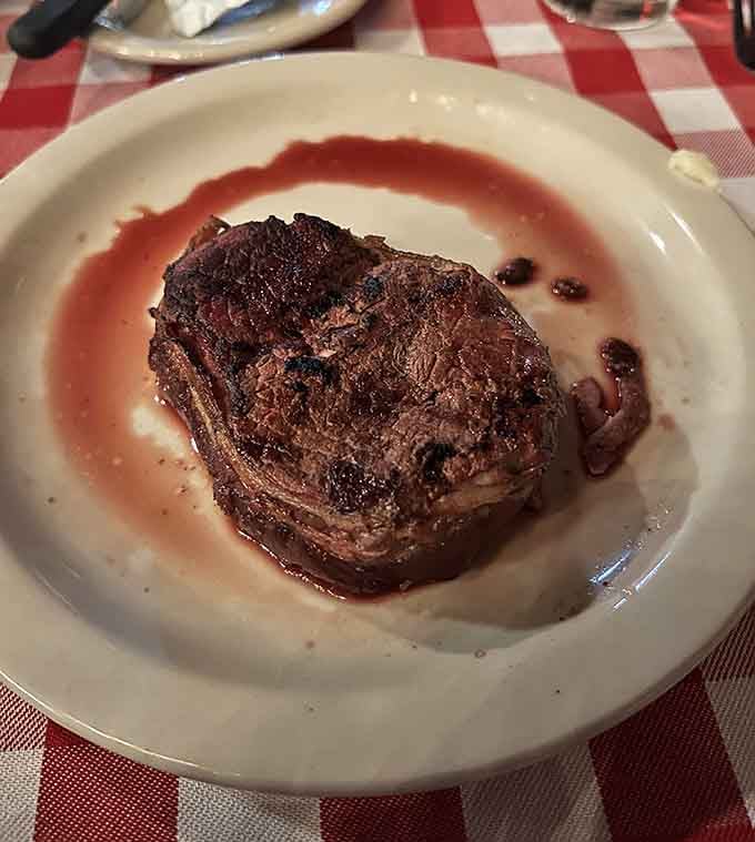 The Cowboy Ribeye arrives like it just won the lottery, thick, juicy, and ready to make your evening unforgettable.