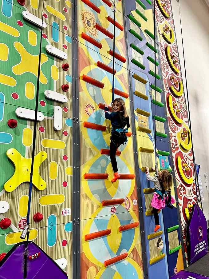 Scaling colorful walls like a caffeinated spider-monkey&mdash;because who says fitness can't look like a rainbow threw a party?